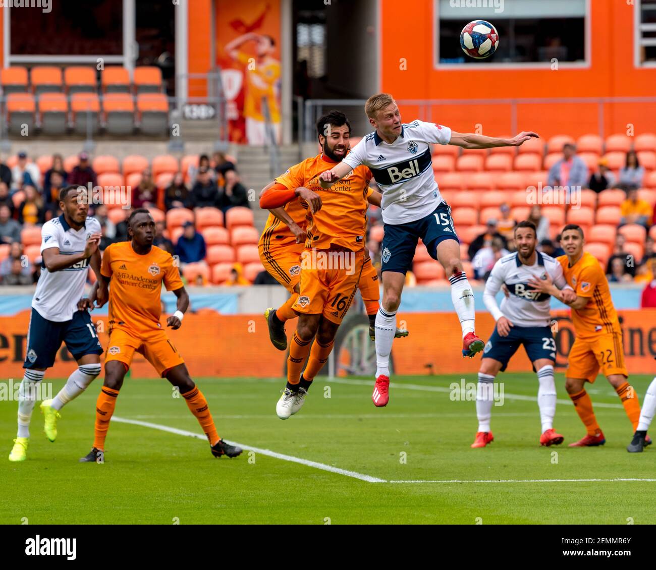 March 16, 2019: Vancouver Whitecaps midfielder Andy Rose (15) and Houston Dynamo defender Kevin ...