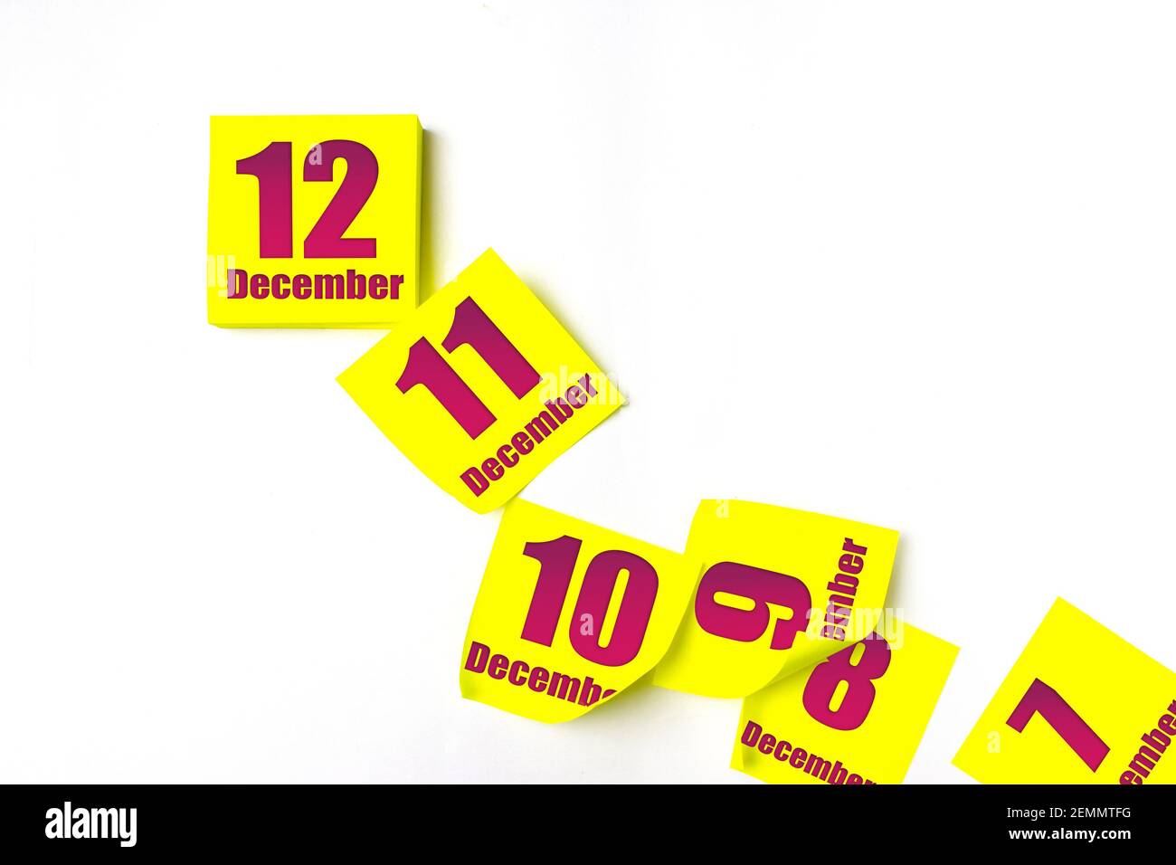 December 12nd. Day 12 of month, Calendar date. Many yellow sheet of the ...