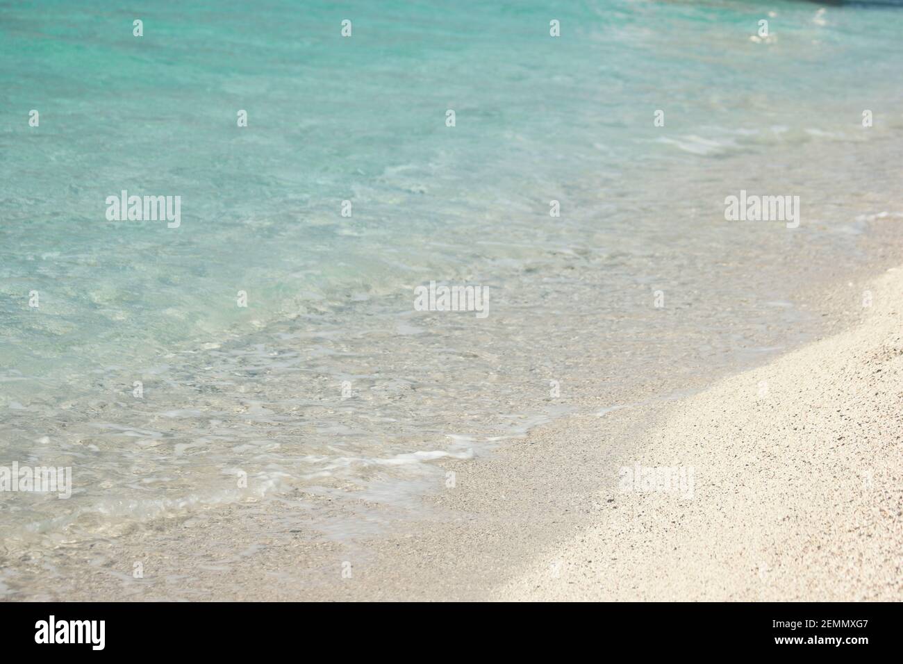 Crystal clear sea water on sandy beach Stock Photo - Alamy