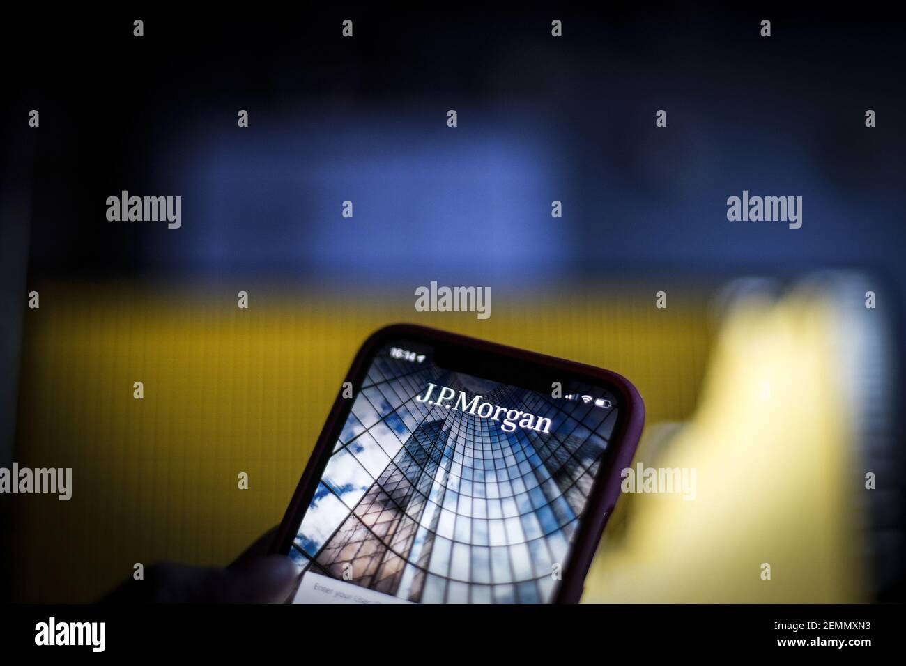 The JP Morgan logo is seen on a mobile device in this photo ...