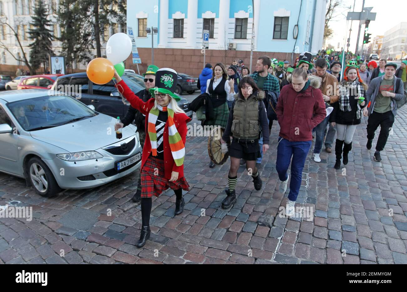 Participants seen crossing the street during the parade. The St ...