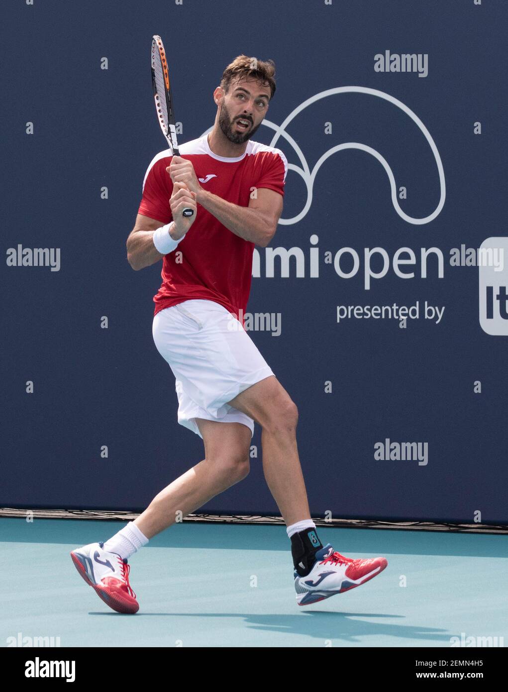 Marcel Granollers of Spain returns a backhand against Zane Khan of ...