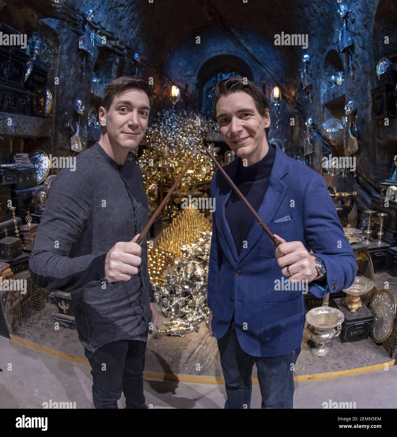 James Phelps (L) and Oliver Phelps in the Lestrange Vault set at the ...