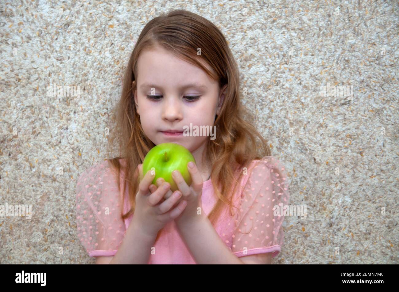 Child girl with apple, healthy food kid Stock Photo - Alamy