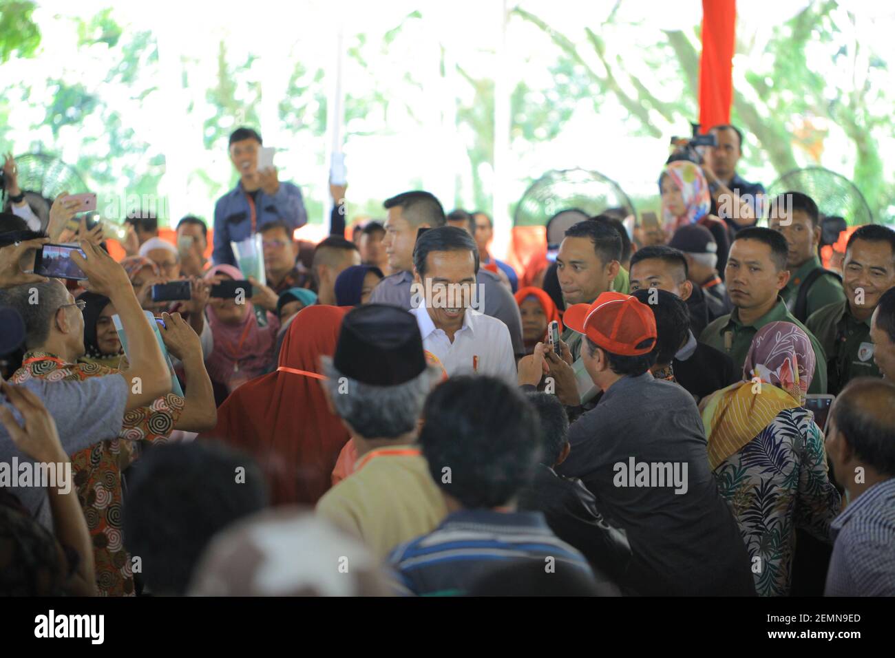 President Joko Widodo seen approaching residents during the Land Certificate for the People in ...