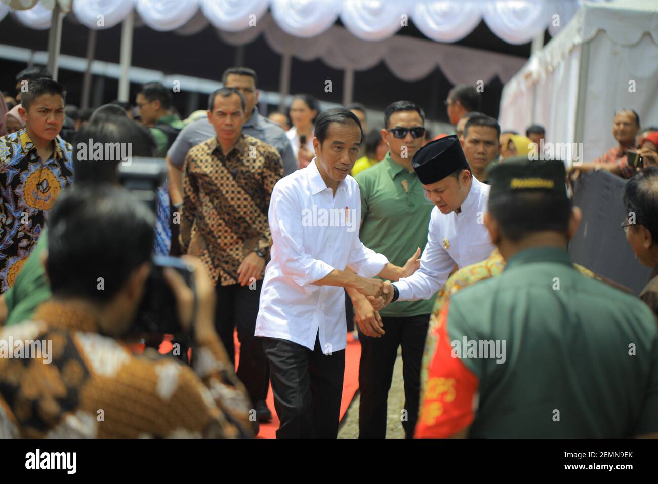 President Joko Widodo (C) seen attending the Land Certificate for the People in Bogor, West Java ...