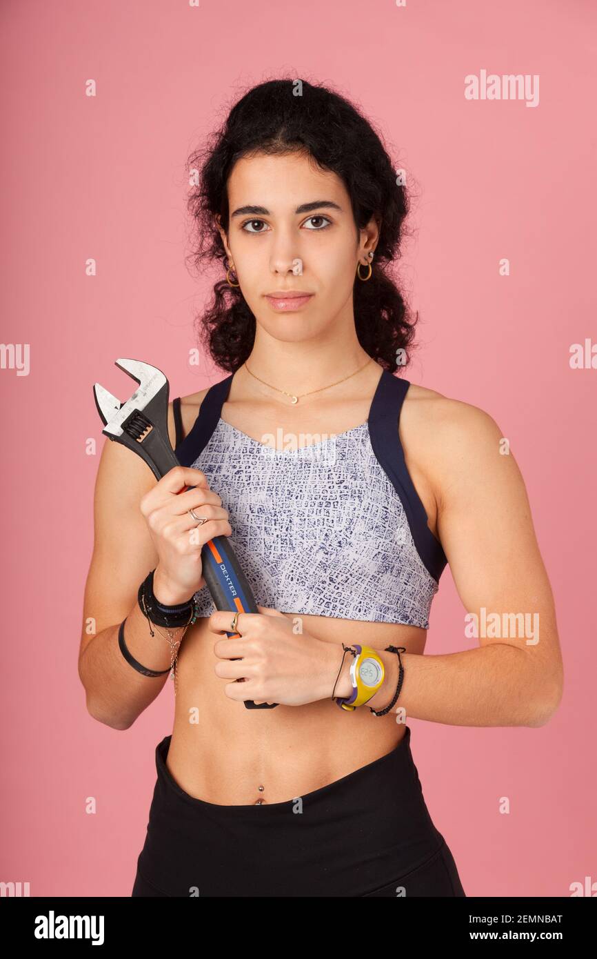 Young professional girl; repairing her own things. woman with skills to ...