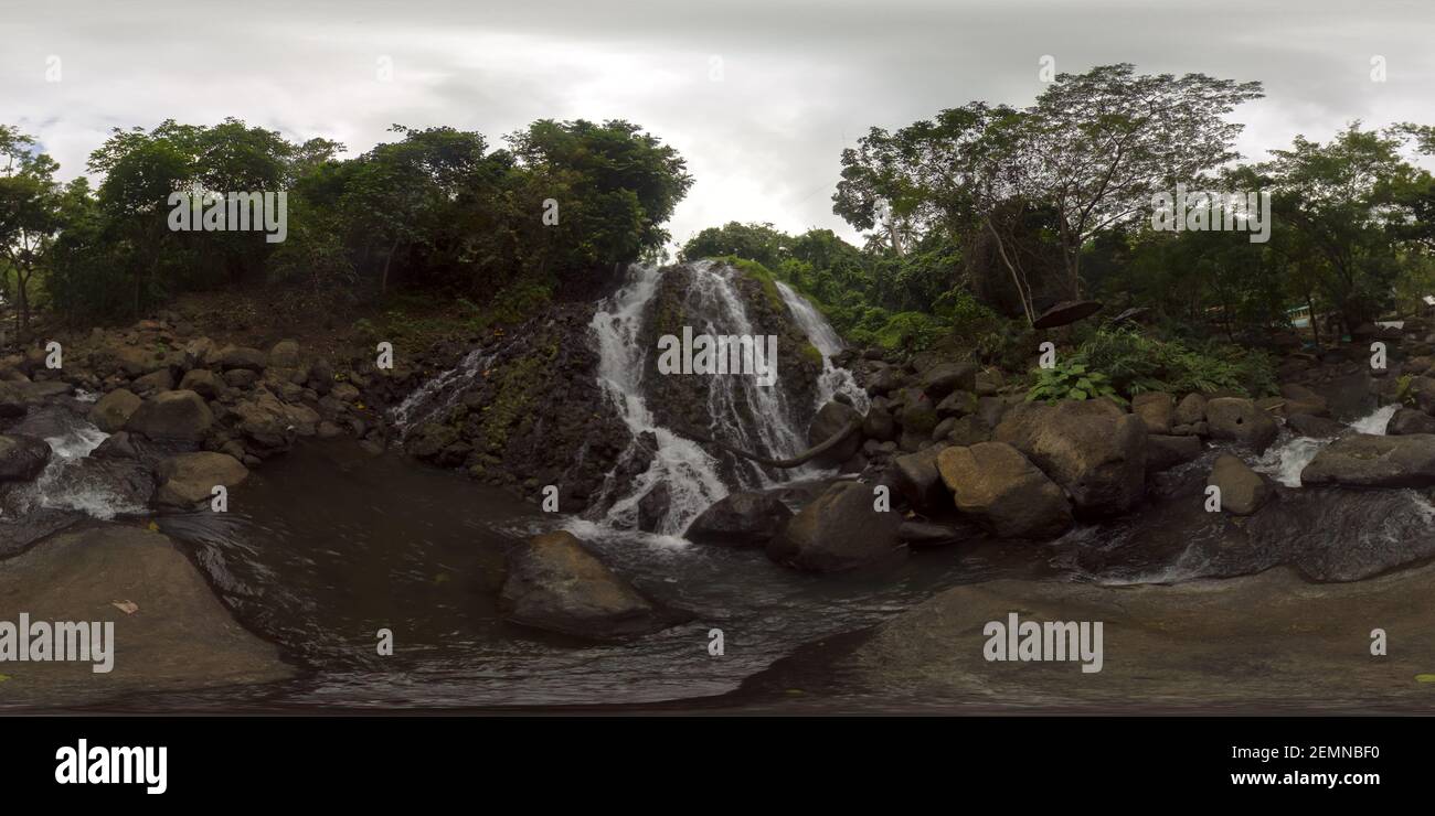 Mimbalut Falls in green forest. Waterfall in the tropical mountain ...