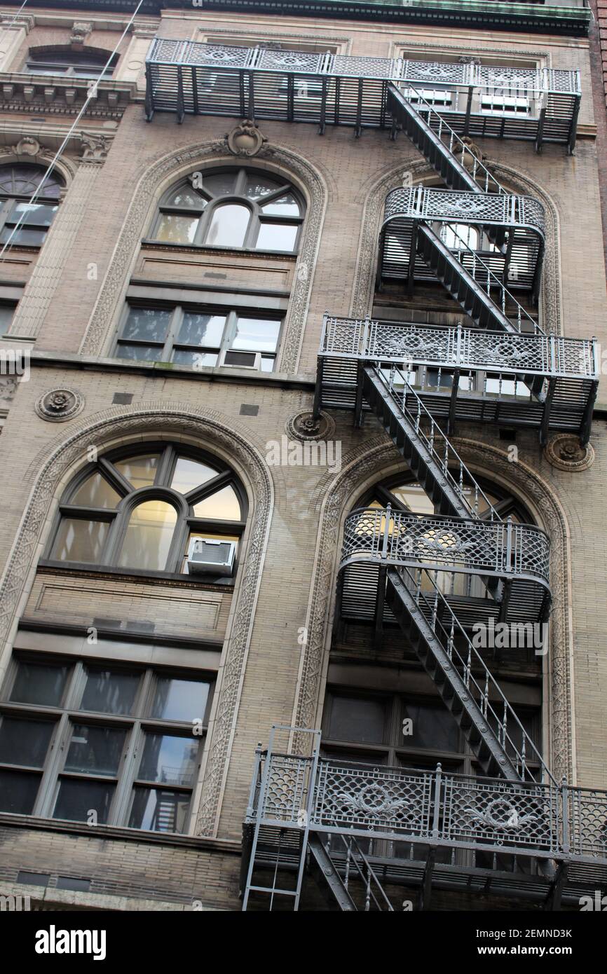 House front ladder fire escape stairs hi-res stock photography and ...