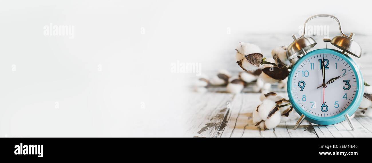 Set your clocks back with this banner of a clock and cotton over a ...
