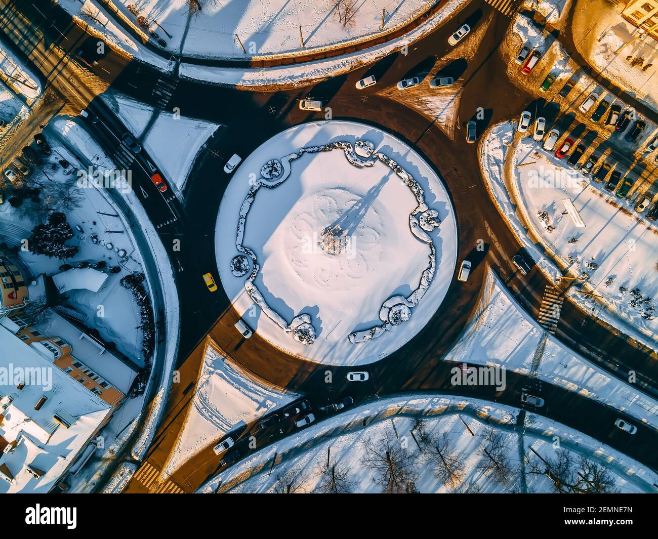 Aerial view of roundabout road with circular cars in small european ...
