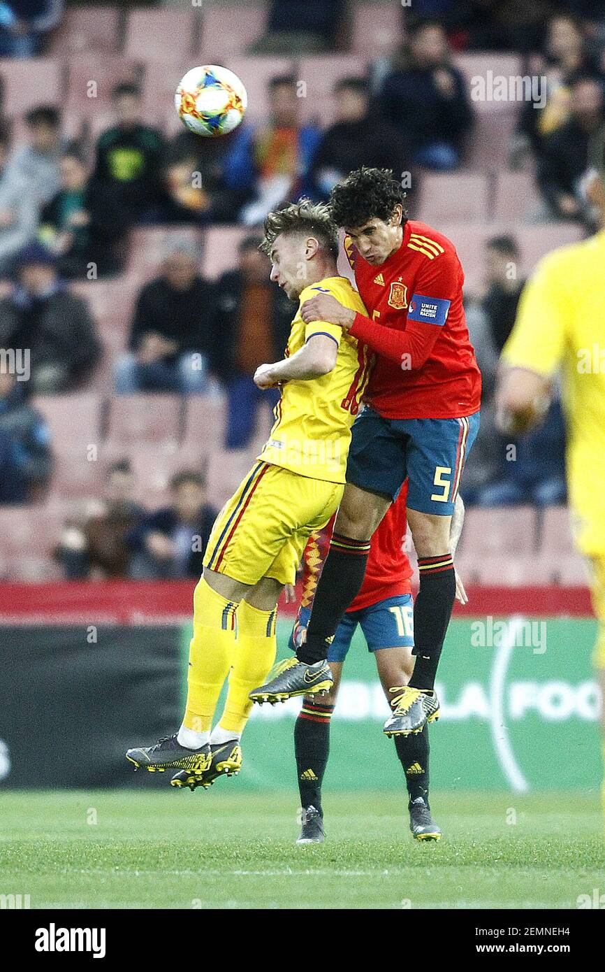 Romania's Dragus Denis and Spain's Jesus Vallejo during the ...