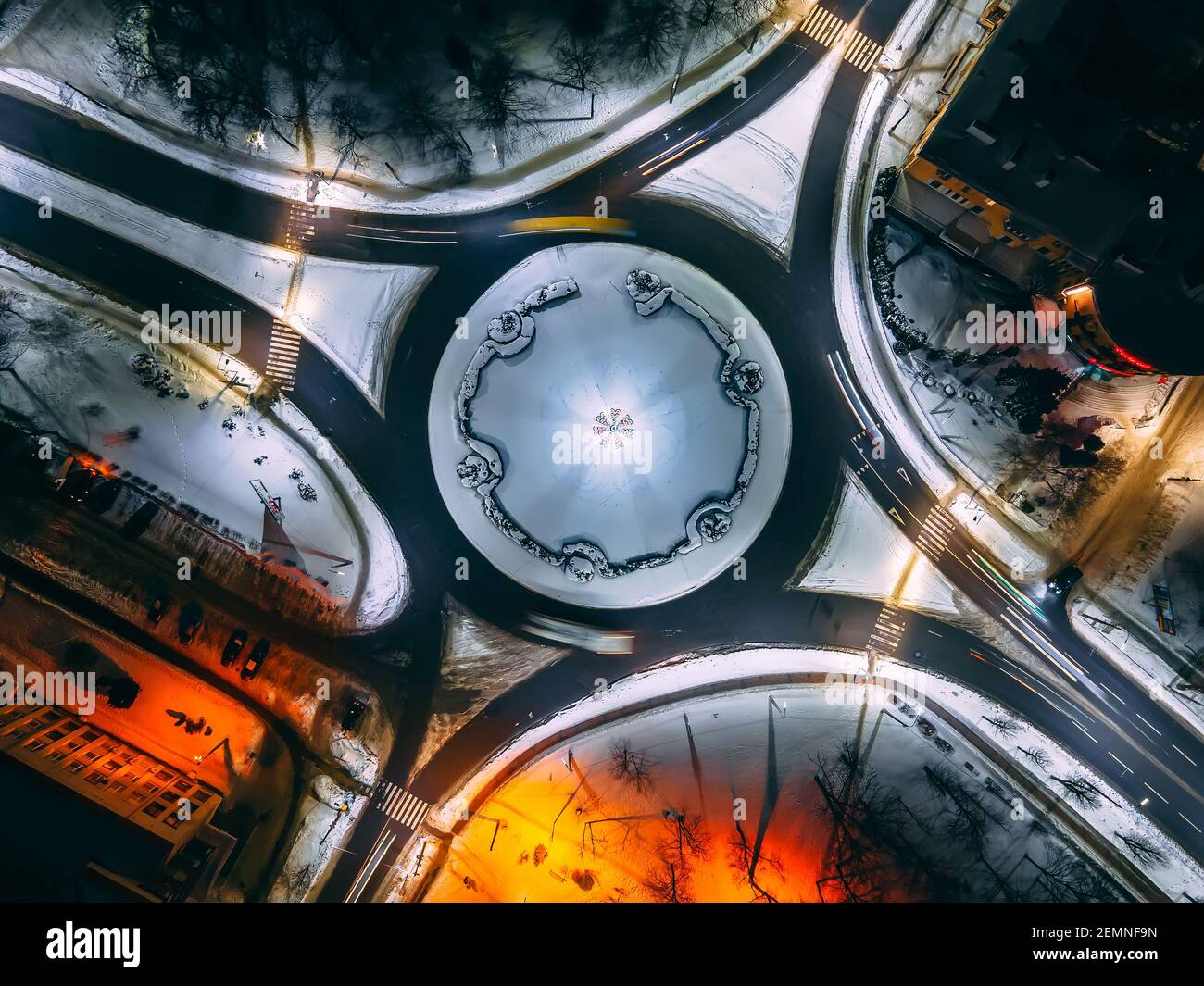 Aerial view of roundabout road with circular cars in small european ...