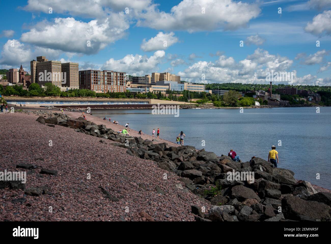 Duluth, Minnesota. People relax and enjoy the beautiful weather along ...