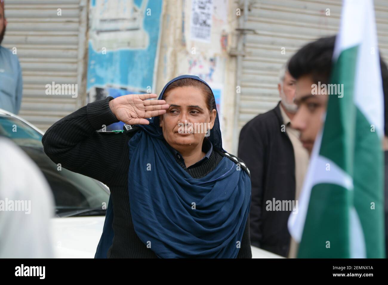 Quetta, Pakistan. March 23rd, 2019: A leady police officer saluting ...