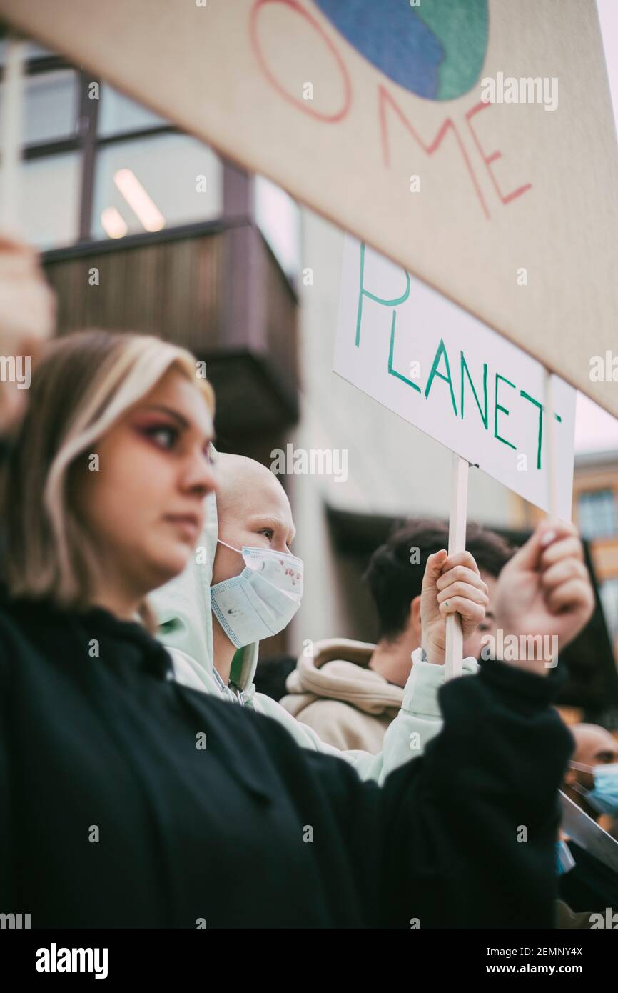 Female protestor participating in social movement for environmental ...