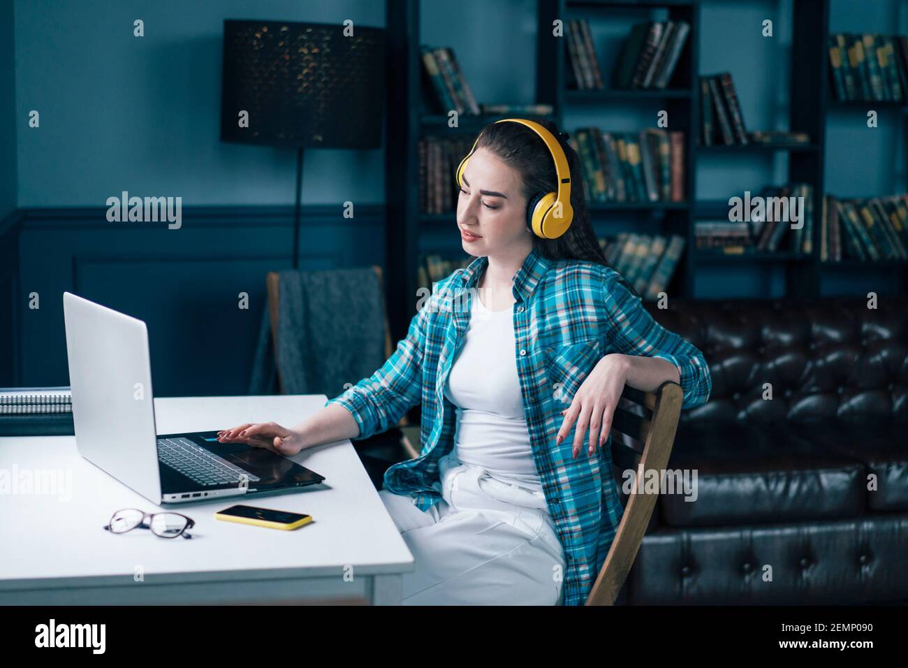Girl student freelancer uses a computer for remote learning Stock Photo ...