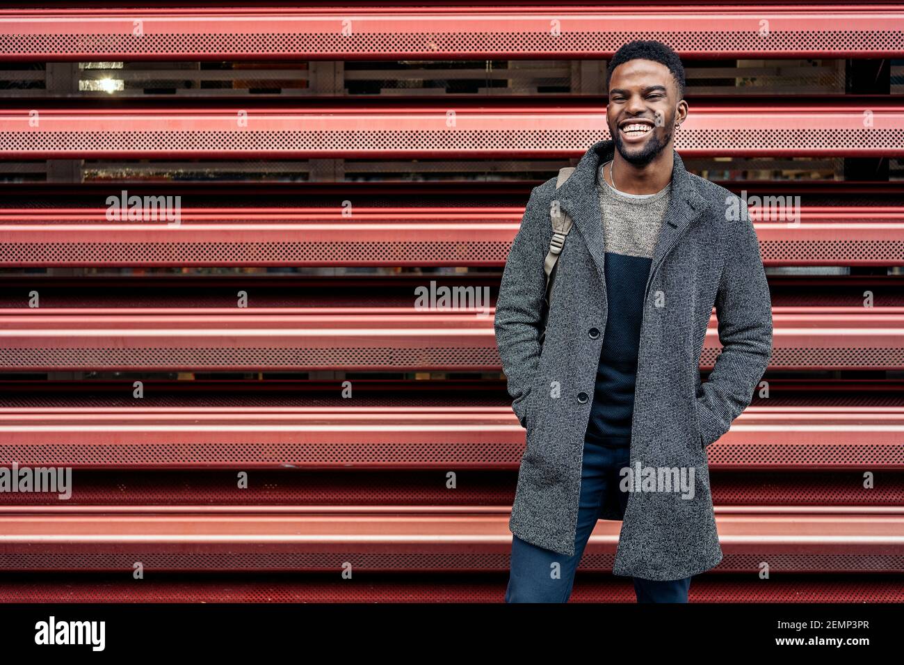 African american looking over wall hi-res stock photography and images ...