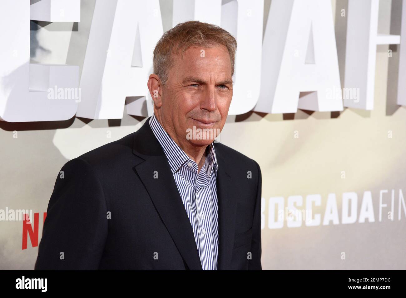 Actor Kevin Costner, 64 years-old, poses for media as he arrives for ...
