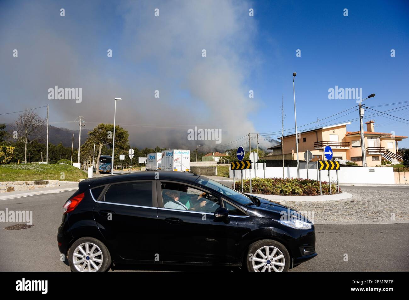 Smoke seen coming from a burning forest due to a wildfire that resulted ...