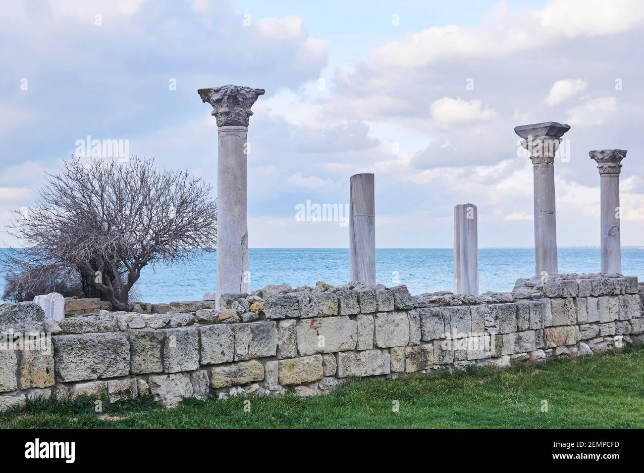 ruins of an ancient Greek temple with columns by the sea shore Stock ...