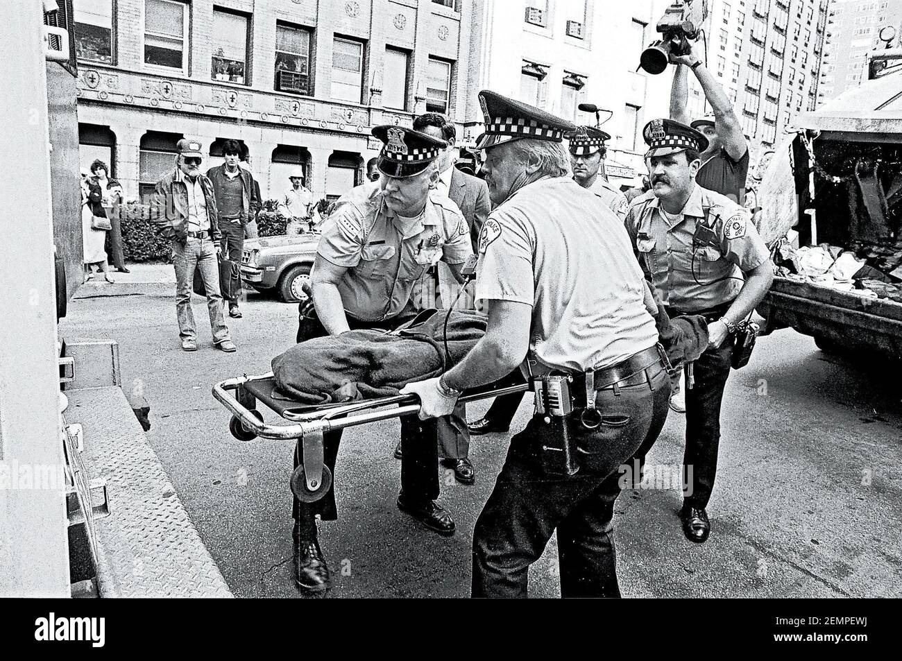 Chicago police carry the body of Rose Beck Davis after she was found ...