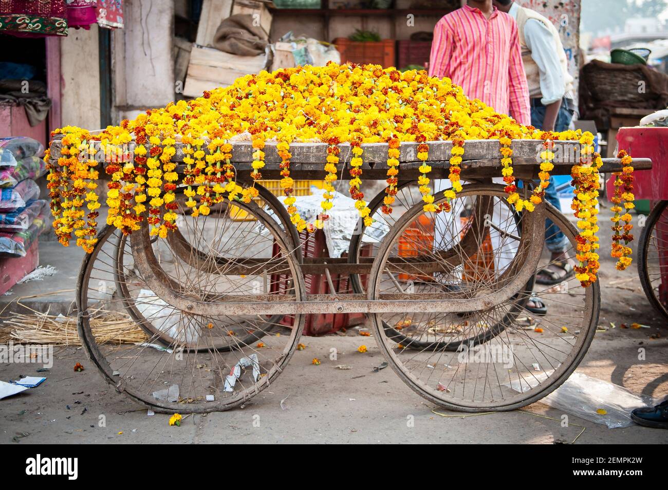 A cart covered in Marigold flowers being sold for Diwali festival, on ...