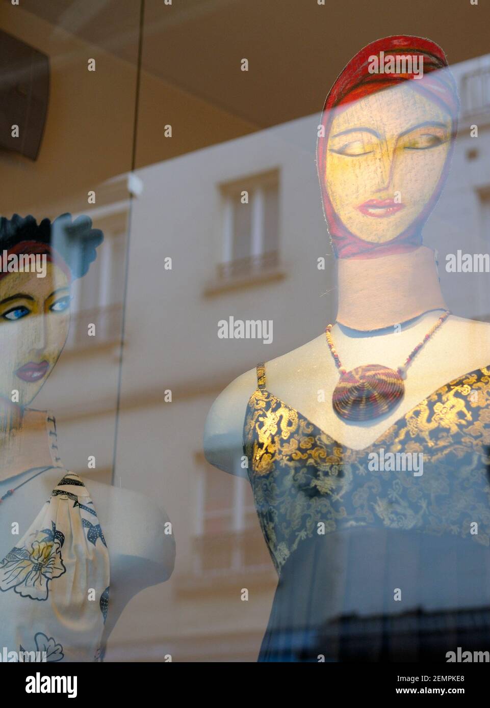 Fashionable clothes in a window display, Paris, Île-de-France, France ...