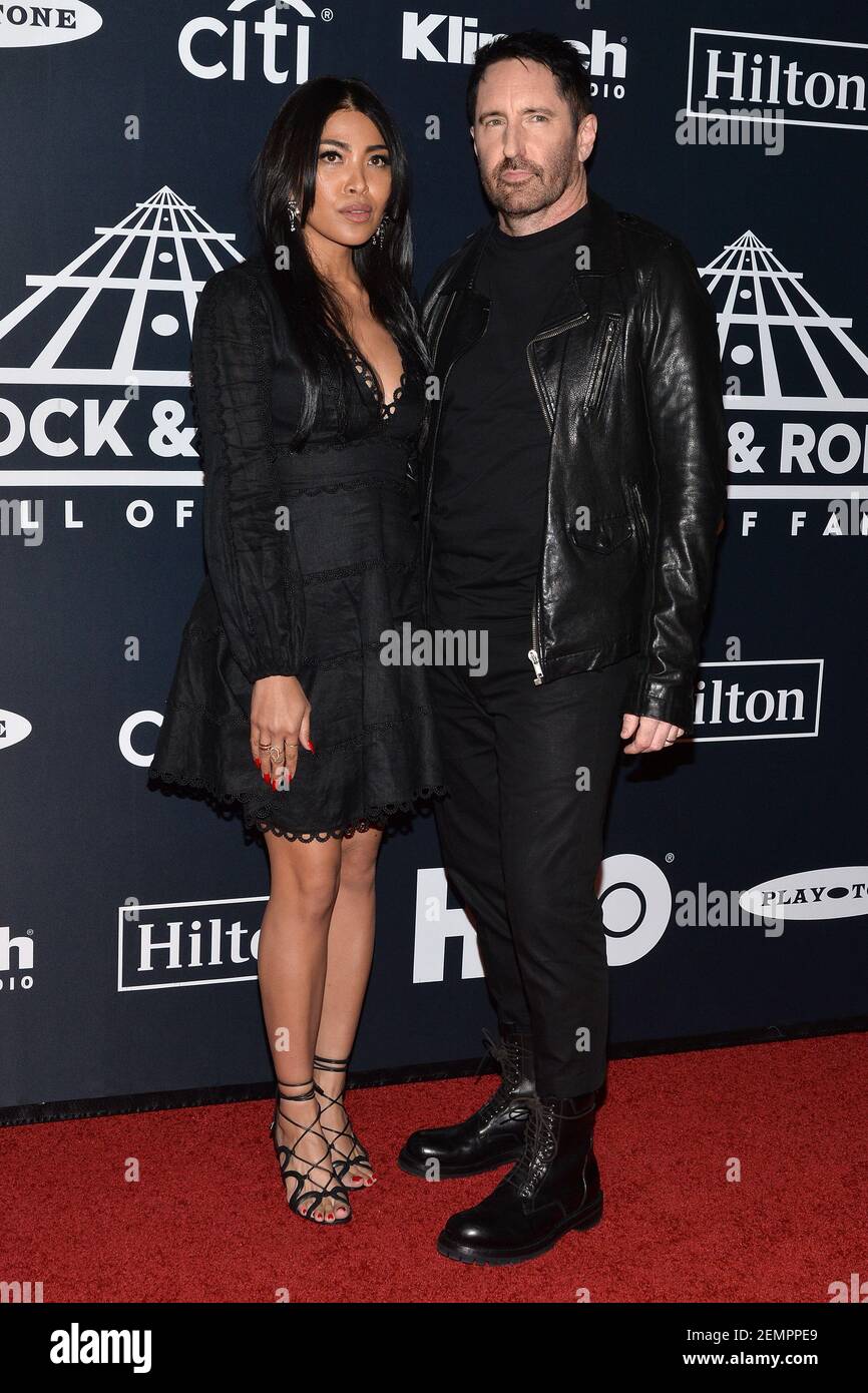 (L-R) Mariqueen Maandig and Trent Reznor attend the 2019 Rock & Roll ...