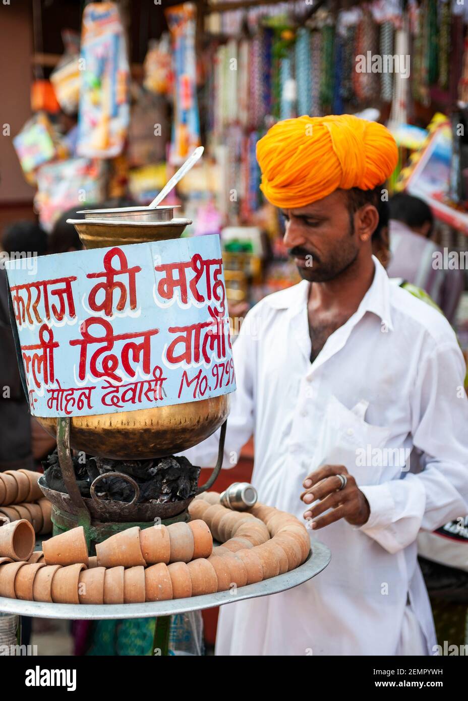An Indian man prepares chai at his stall in Pushkar, India Stock Photo ...