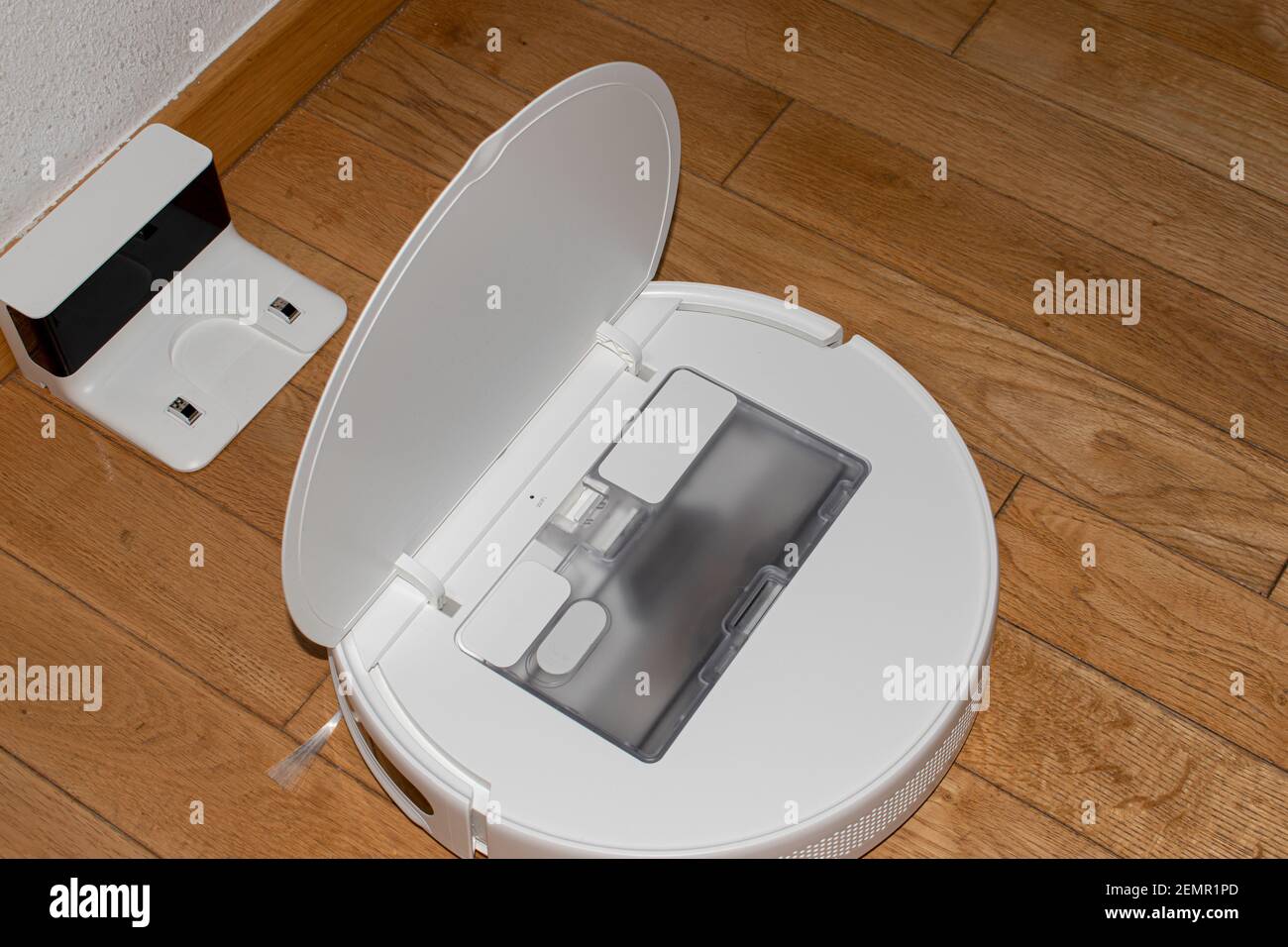 Robotic Vacuum Maintenance and Cleaning Stock Photo - Alamy