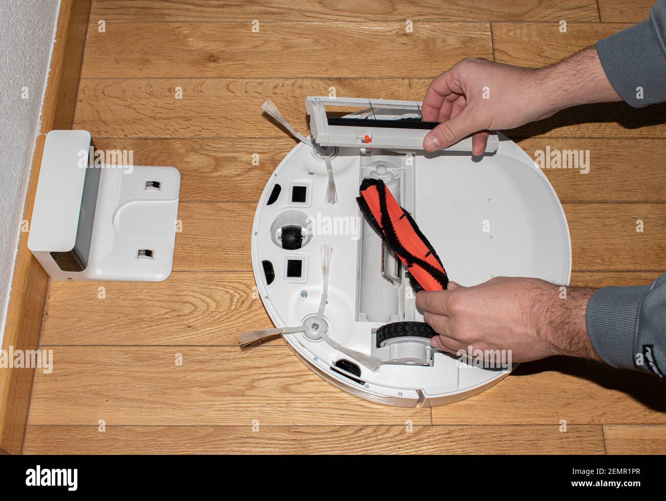 Robotic Vacuum Maintenance and Cleaning Stock Photo - Alamy
