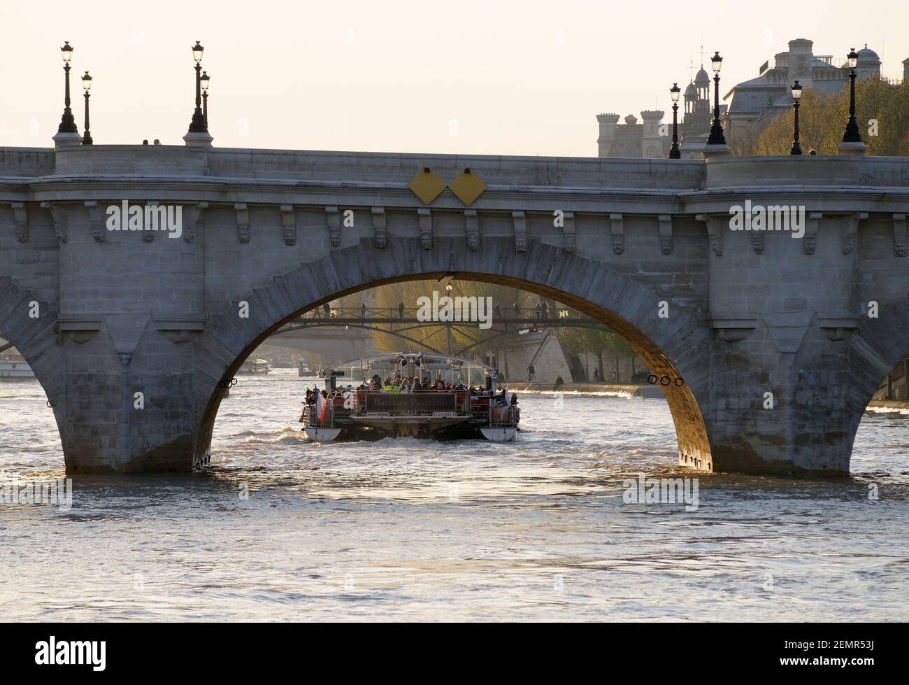 Barge passing under a Paris bridge, Paris, Île-de-France, France Stock ...