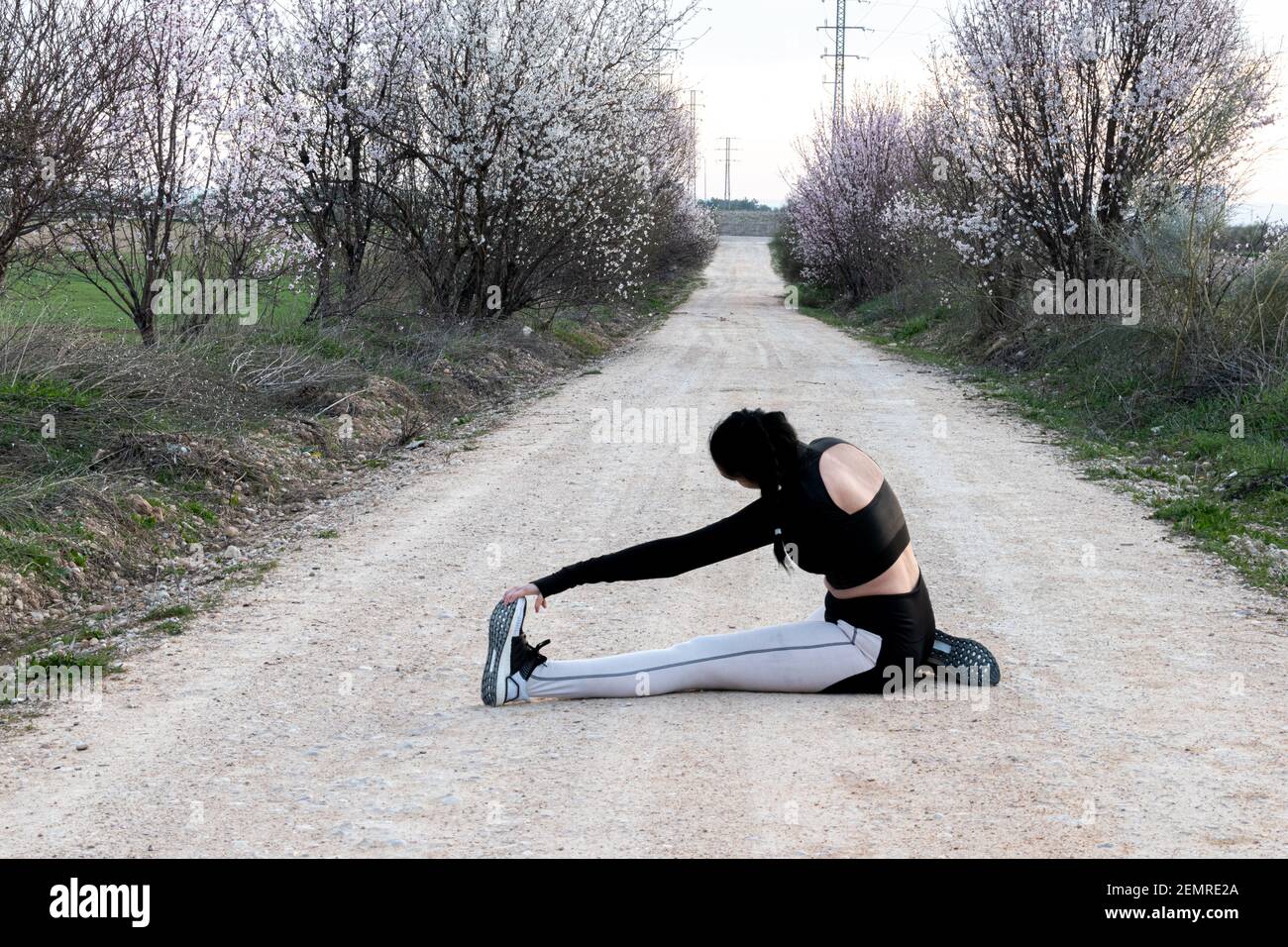 Running stretching at dawn Stock Photo - Alamy