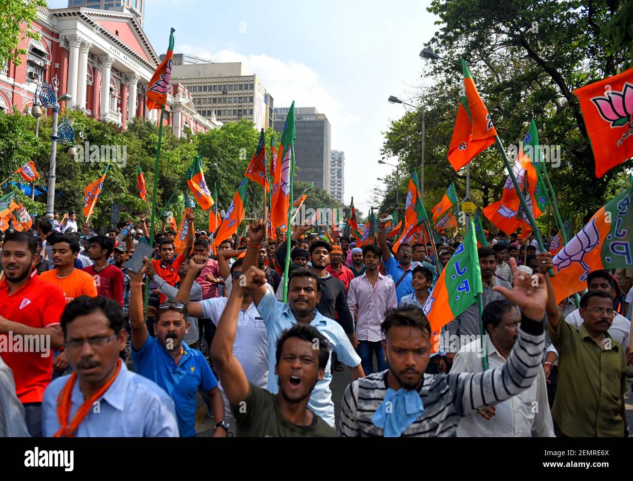 Supporters of BJP seen waving Flags walking towards the meeting place ...