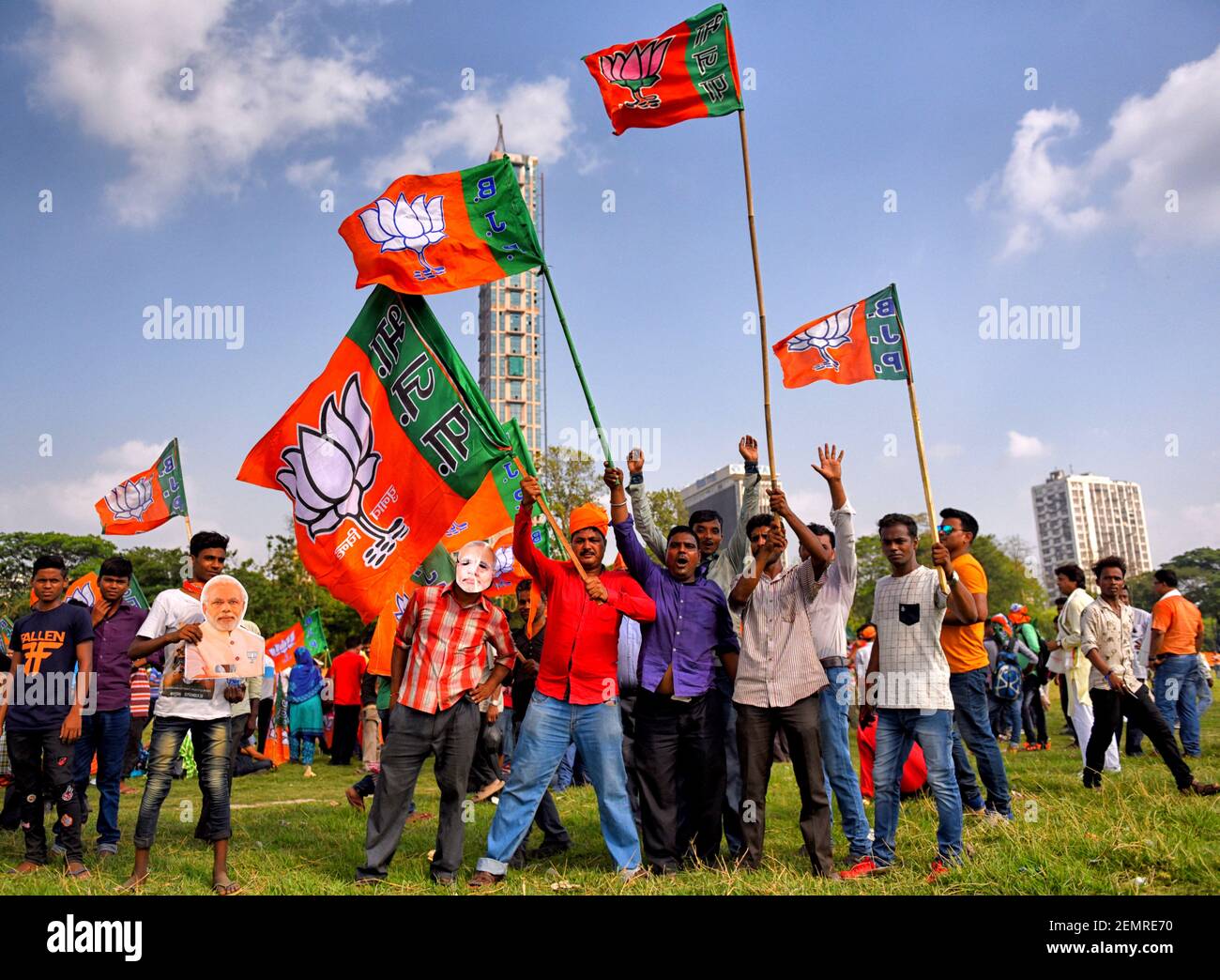 Supporters of BJP seen waving Flags walking towards the meeting place ...