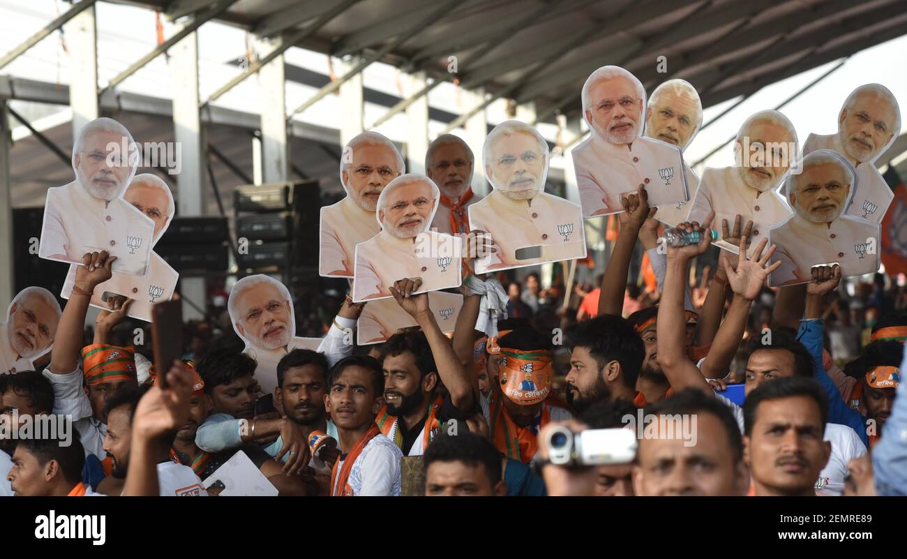 KOLKATA, INDIA - APRIL 3: Crowd with posters of Prime Minister Narendra ...
