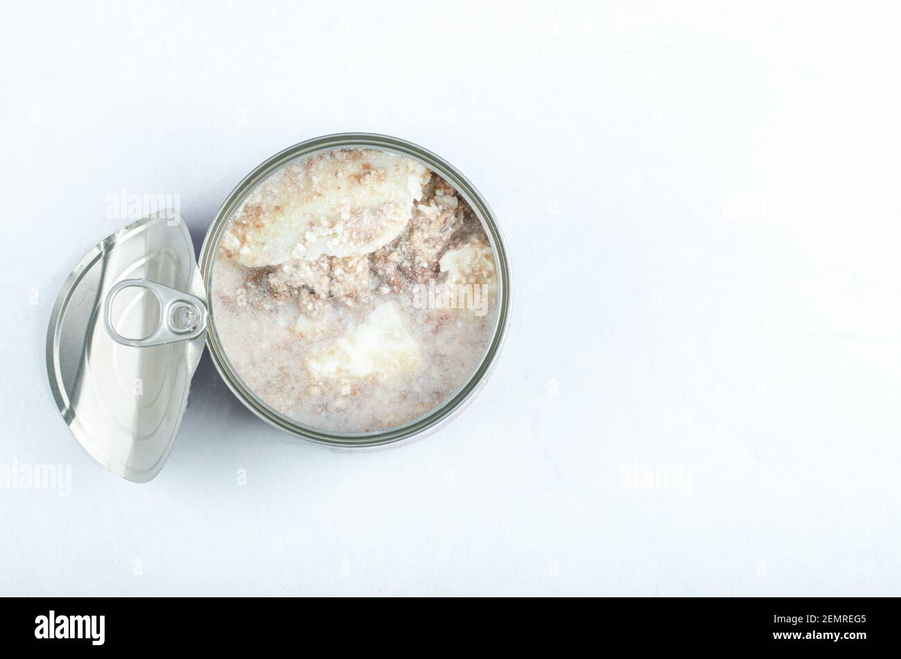 Top view of open canned beef on white background Stock Photo - Alamy