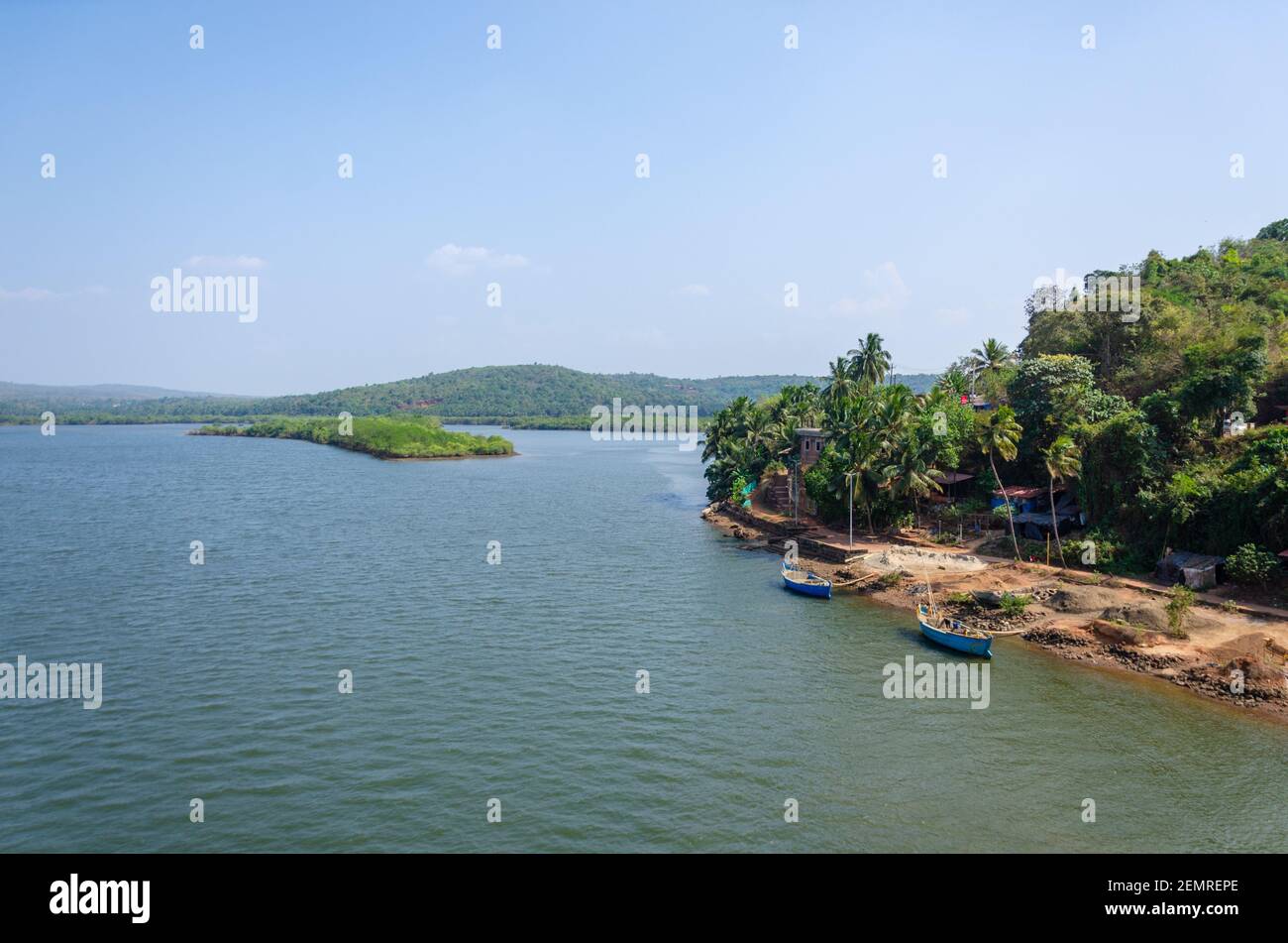 View of sand mining on the shores of Tiracol River as seen from Aronda ...