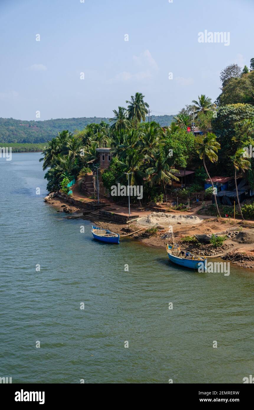 View of sand mining on the shores of Tiracol River as seen from Aronda ...