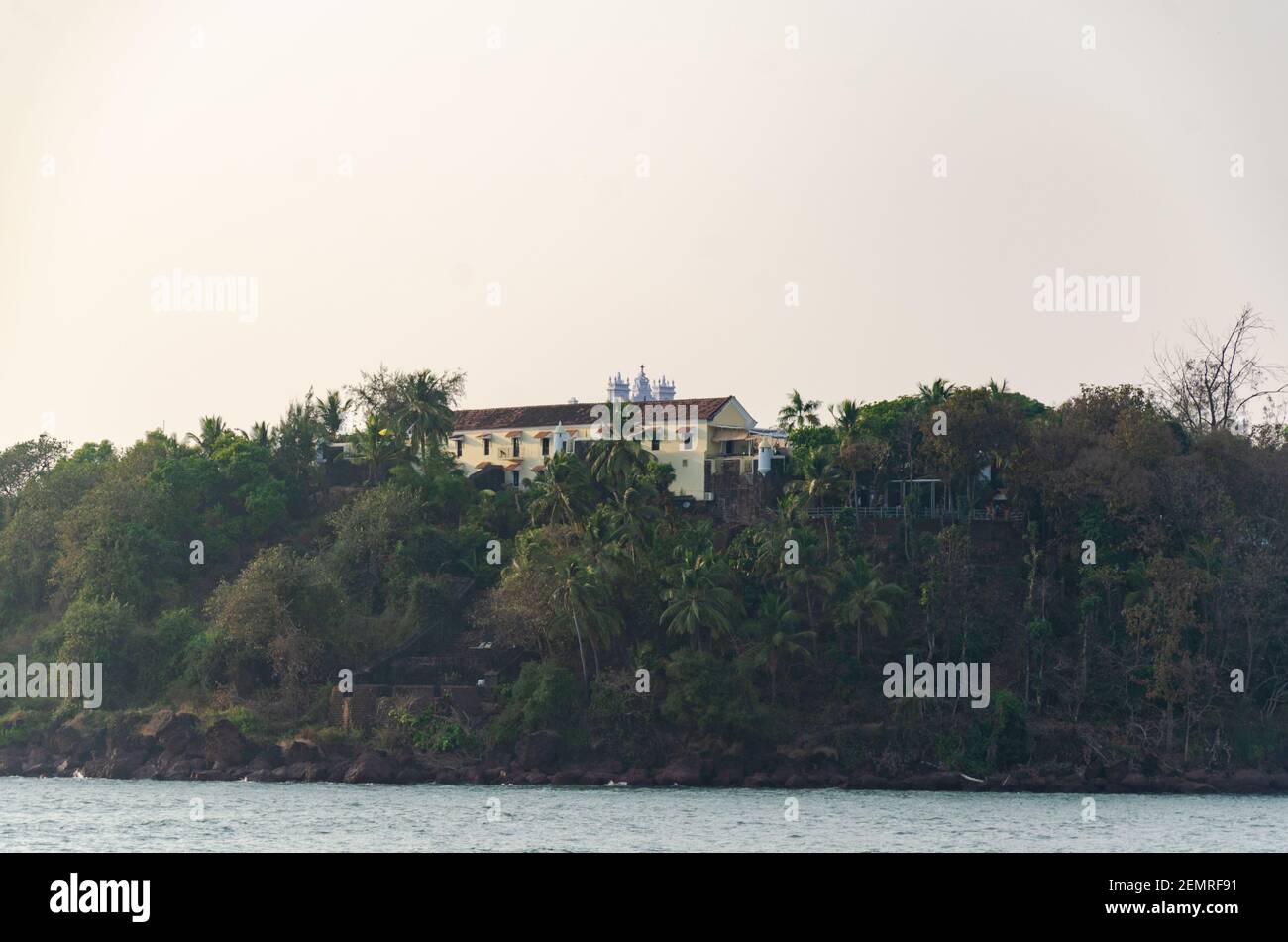 Fort Tiracol as seen from Querim Beach, Goa, India Stock Photo - Alamy