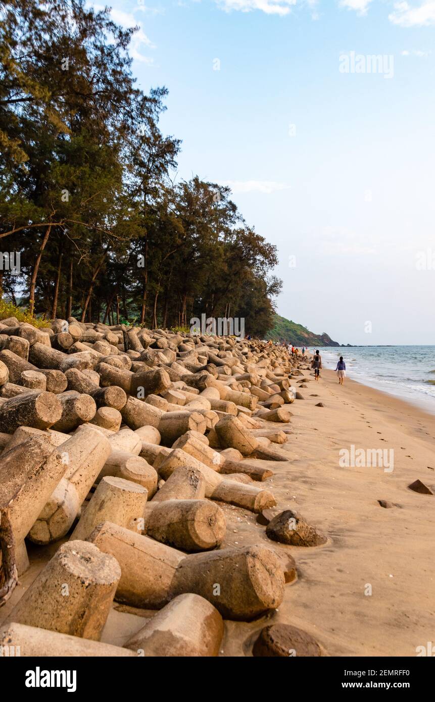 Querim Beach with tetra pods on the shore to prevent soil erosion. Querim or Keri Beach is ...