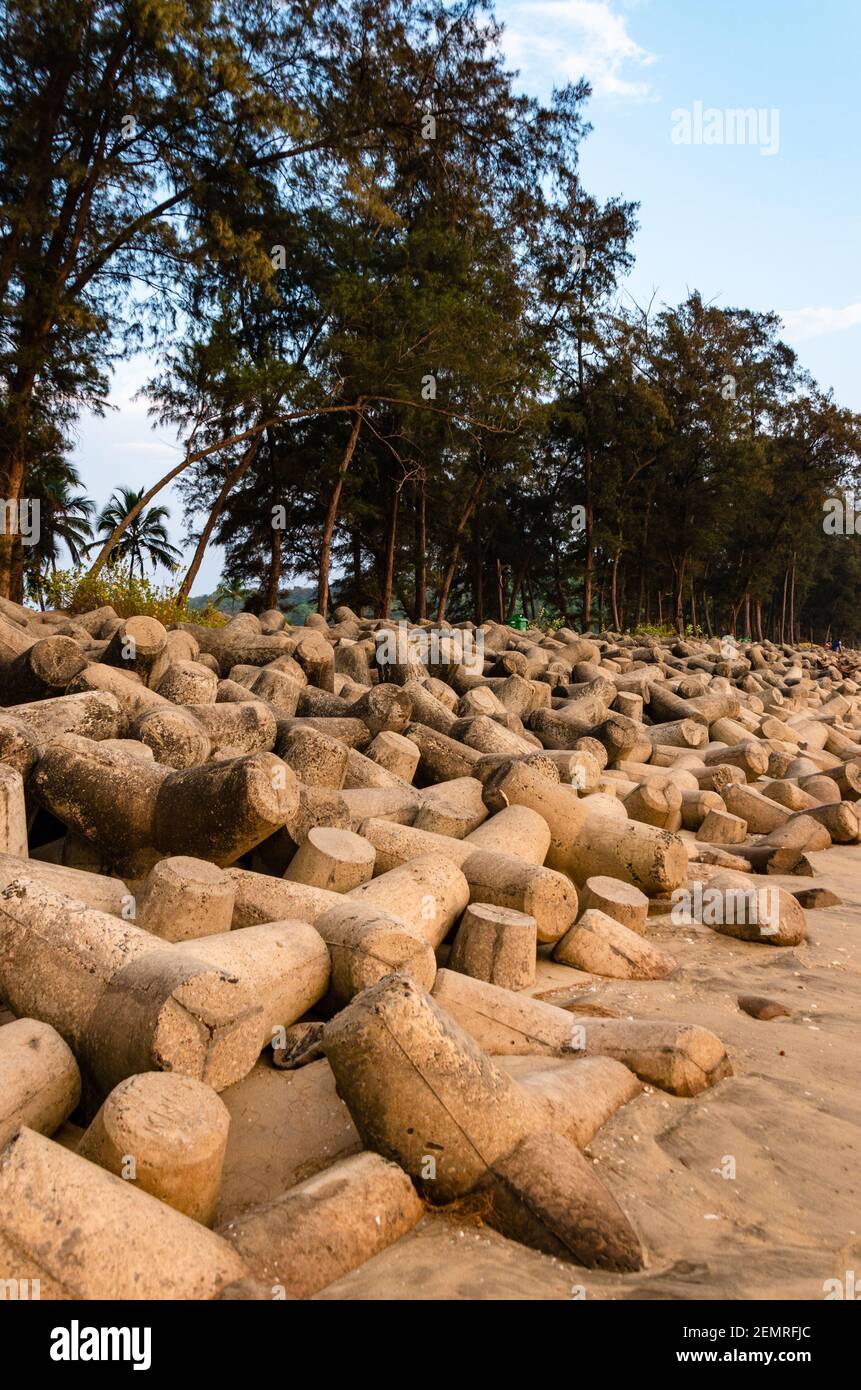 Querim Beach with tetra pods on the shore to prevent soil erosion. Querim or Keri Beach is ...