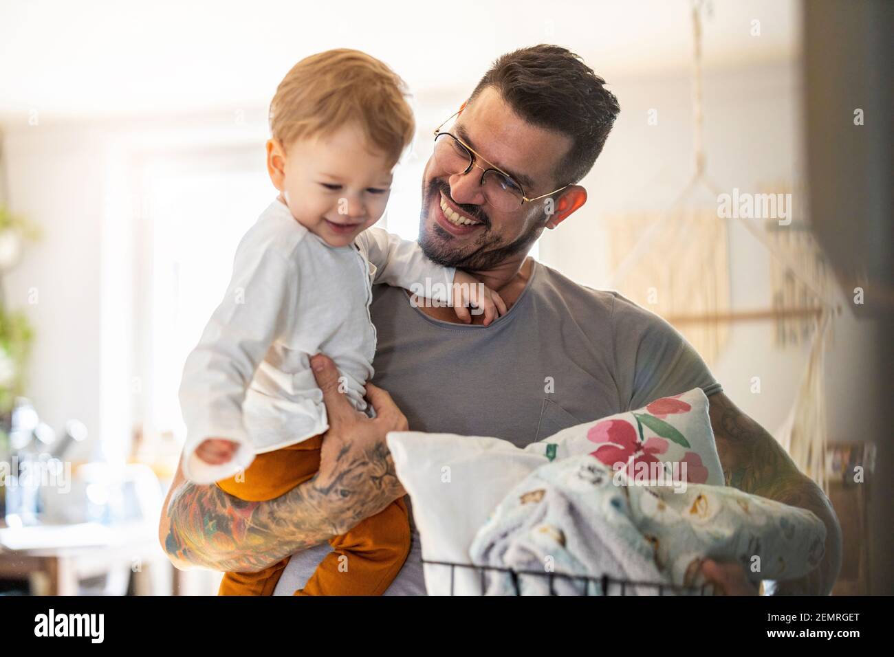 Father and baby son having fun together at home Stock Photo - Alamy