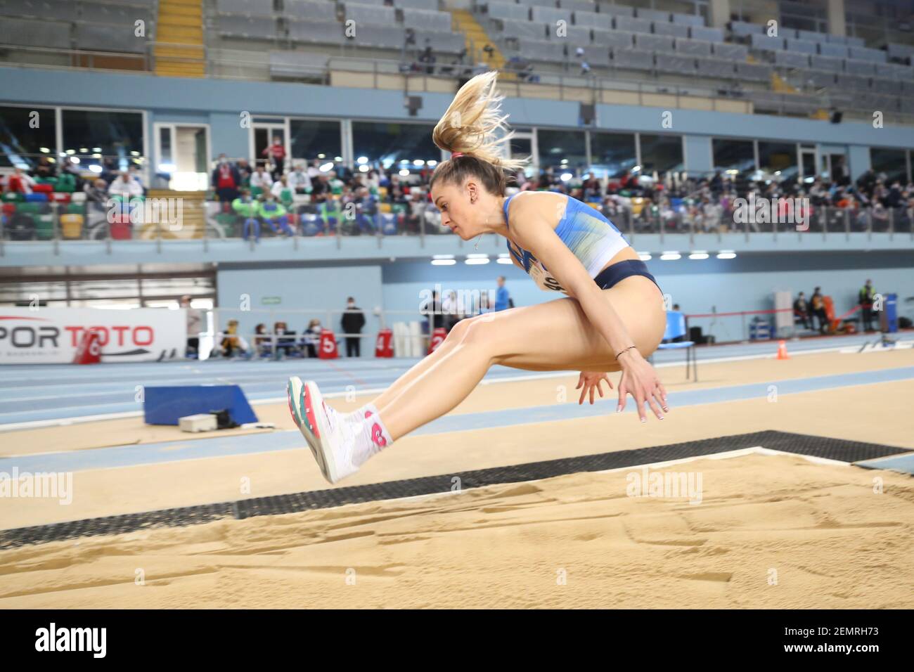 ISTANBUL, TURKEY - FEBRUARY 20, 2021: Undefined athlete triple jumping ...