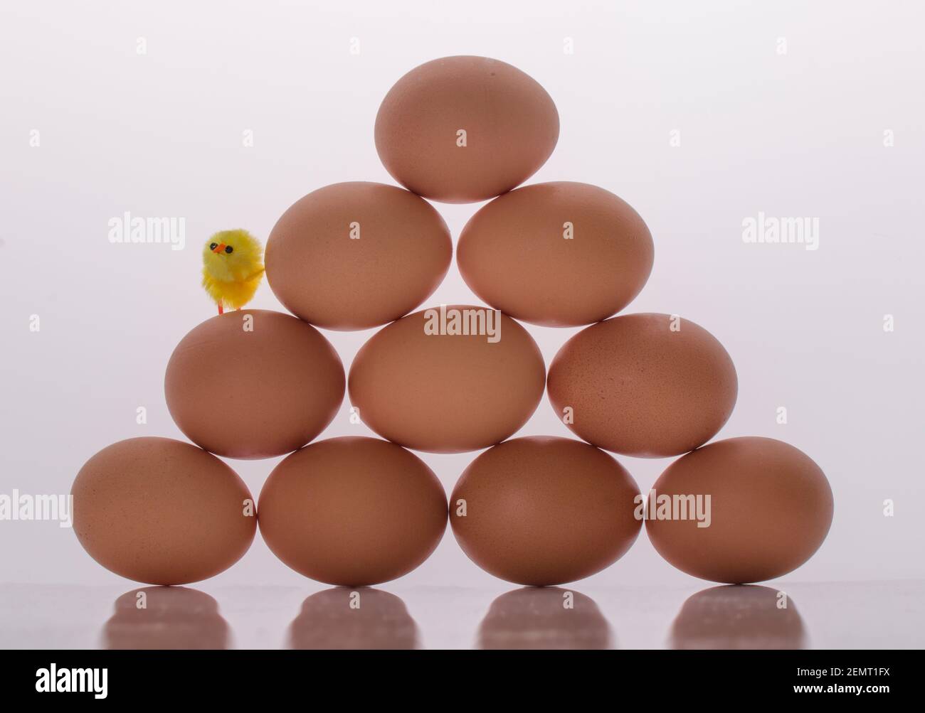 Nice pyramid made from ten eggs and chicken Stock Photo - Alamy