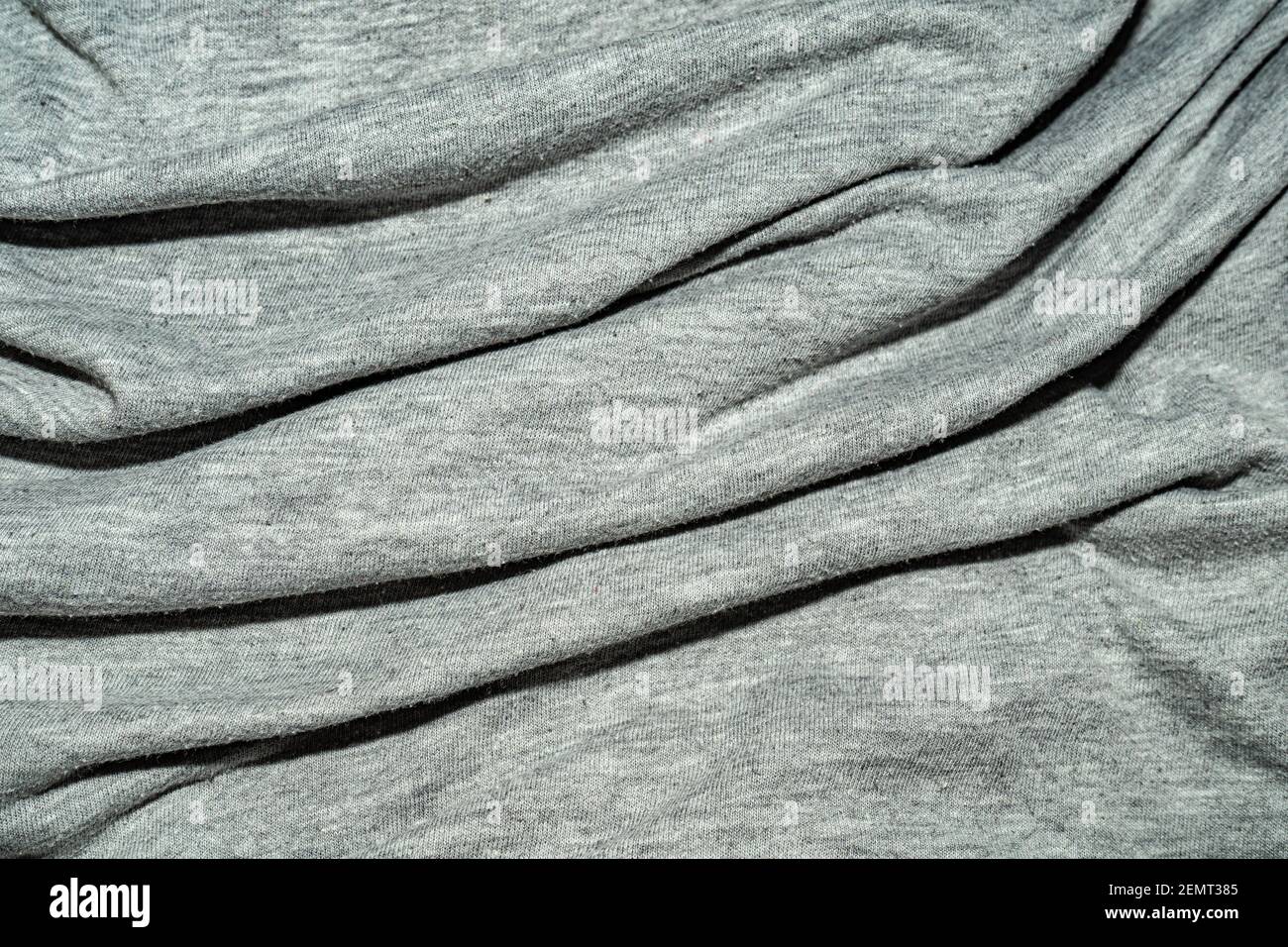 wrinkled gray cotton fabric with many folds Stock Photo - Alamy
