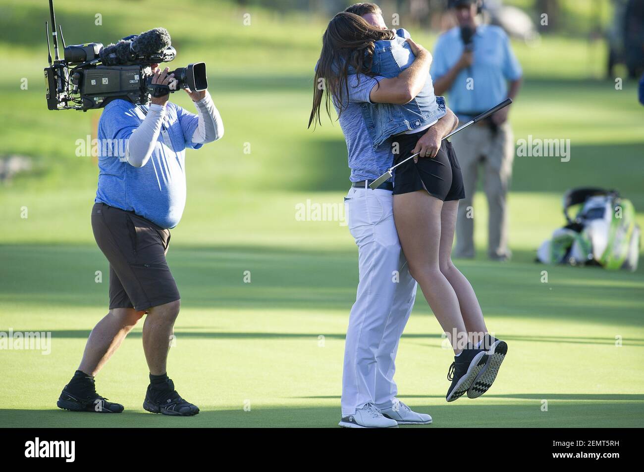 April 07, 2019: Corey Conners celebrates his win with wife Malory ...