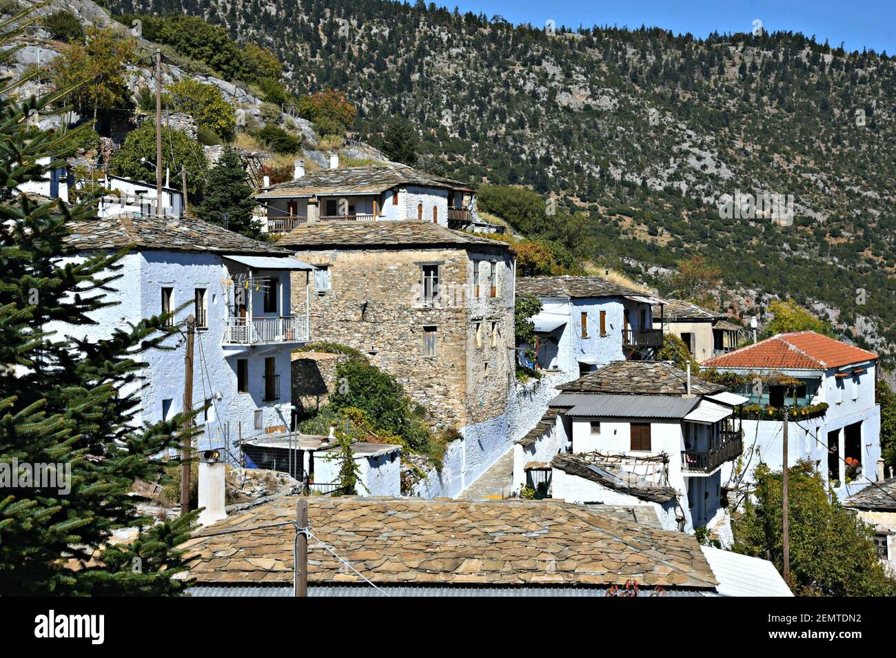 Traditional lye whitewashed stone houses with shingled ash-green slate ...