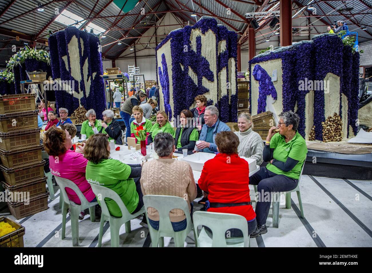 SASSENHEIM - Building up the flower cars for the flower parade on ...